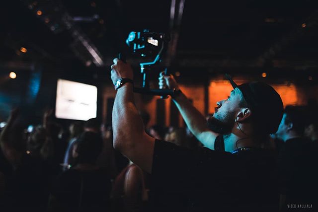 Videographer Filming Live Event Crowd Energy