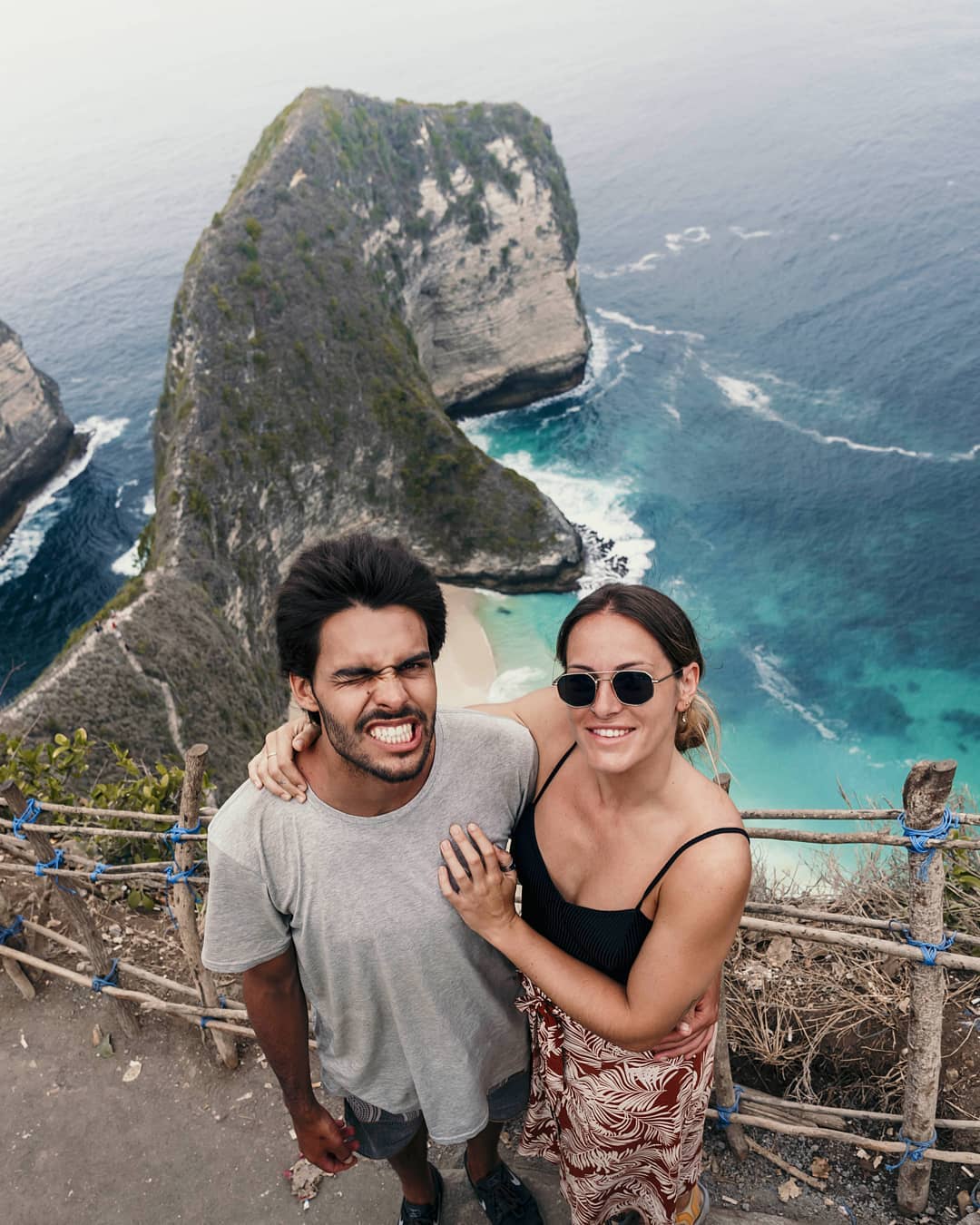 Couple Cliffside Tropical Island Vacation
