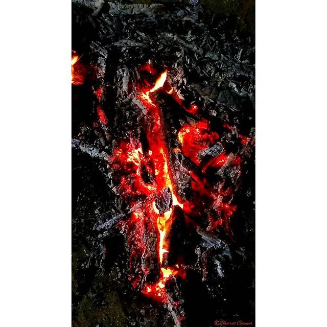 Glowing Embers Ash Fiery Intensity Dark Background
