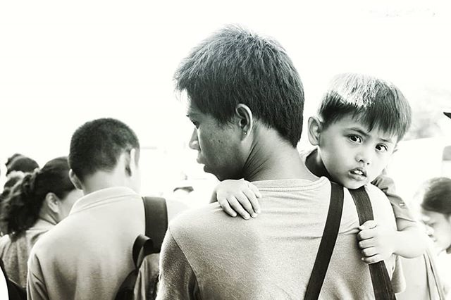 Father Son Carry On Back Crowd People