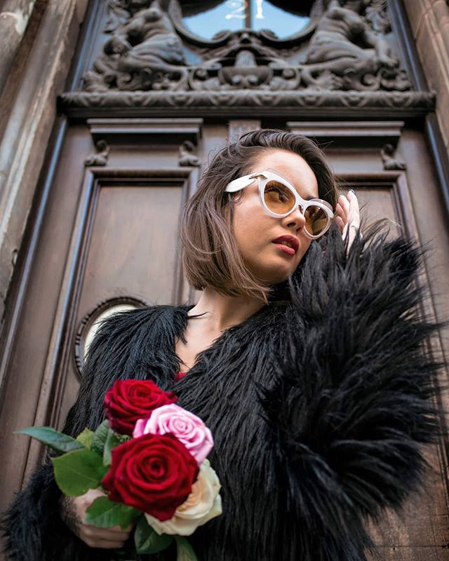 Stylish Woman Fur Coat Roses Ornate Door
