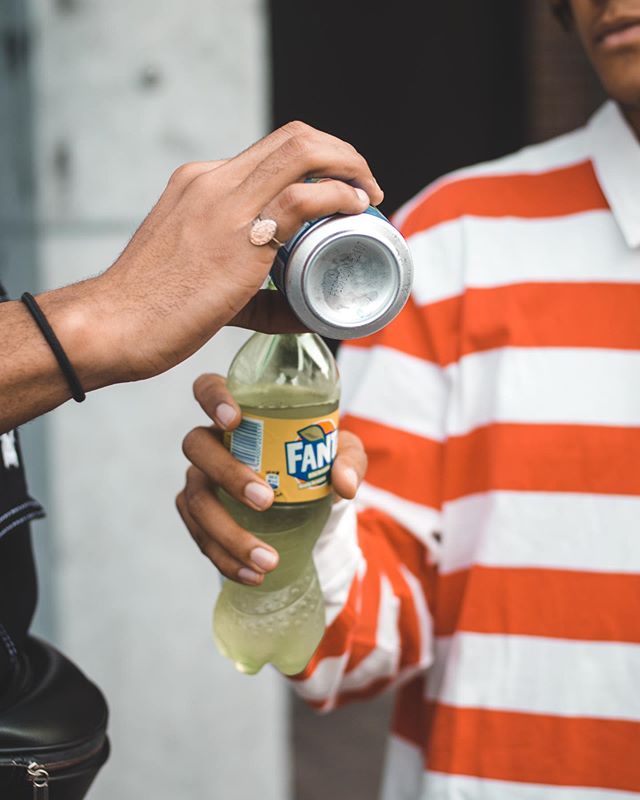 Pouring Soda Into Fanta Bottle Refreshment Drink