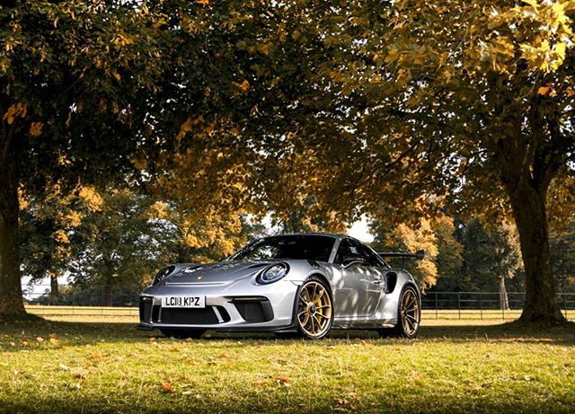 Silver Porsche Gt3 Parked Grassy Lawn Trees Golden Hour