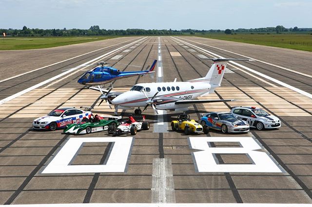 Race Cars Plane Helicopter On Airport Runway