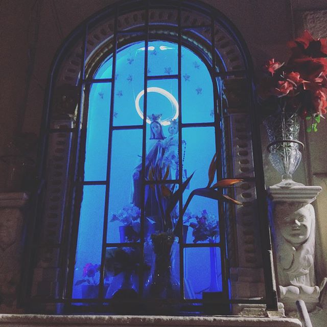Virgin Mary Jesus Statue Behind Bars