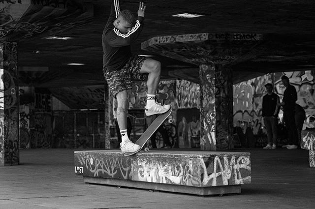 Skateboarder Trick Urban Setting Graffiti Ledge